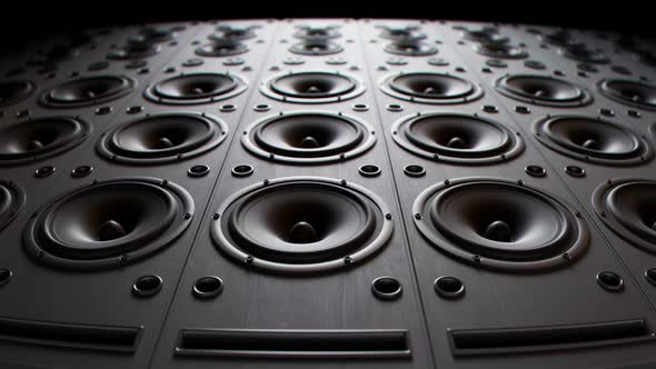 Modern speakers stacked in an endless wall loop. Membranes vibrate ...