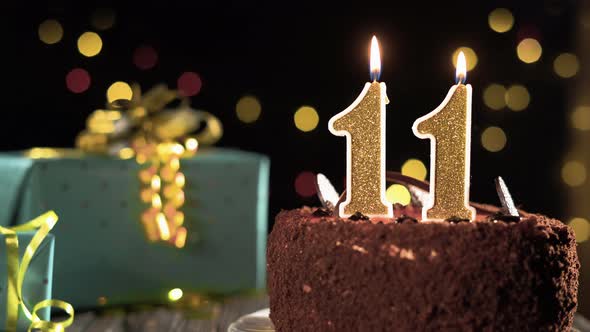 Birthday Cake Golden Candle Number 11 Eleven Fire From a Lighter ...