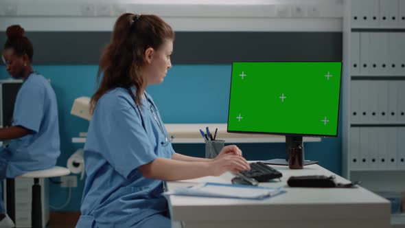 Healthcare Assistant Using Computer for Horizontal Green Screen, Stock ...