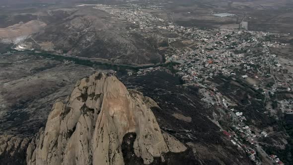 Aerial View Of Peña de Bernal Monolith And San Sebastian Bernal Town In ...