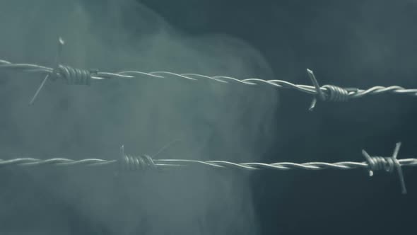 Barbed Wire With Thick Smoke Moving Shot, Stock Footage | VideoHive