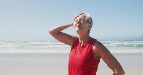 Tired senior woman on the beach, Stock Footage | VideoHive