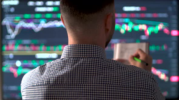 Stock Market Businessmen Trading Online Taking Notes From Graphs, Stock ...