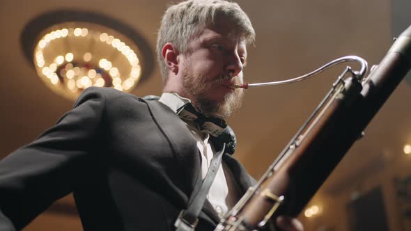 Talented Musician with Traditional Wind Instrument on Scene Man is ...