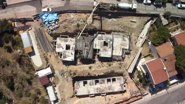 Fly Over the Construction Site Work As Construction Personnel Builders ...