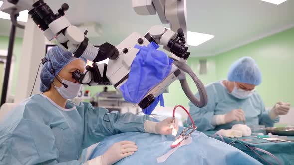 Doctors Are Performing Operation on Human Ear Is Using Powerful Stereo ...