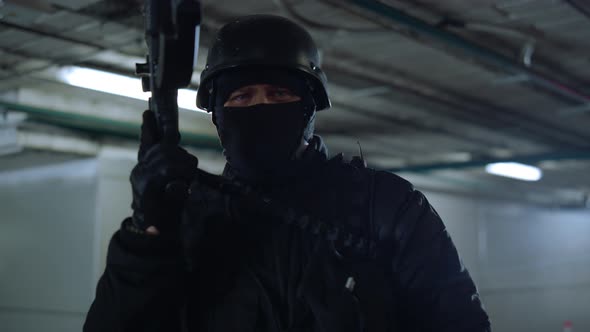 SWAT Soldier Posing at Camera with Assault Rifle in Urban Building ...