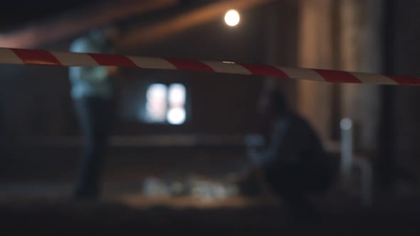 Detectives Standing at Crime Scene Near Dead Body on Blurred Background ...