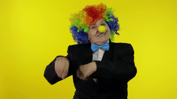 Senior Old Woman Clown in Wig Having Fun, Smiling, Dancing, Making Silly Faces, Stock Footage