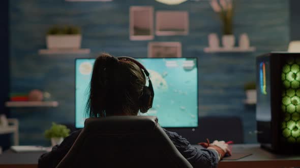 Pro Gamer Playing Video Game with New Graphics Winning Championship ...