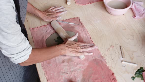 Female Hands Flattening and Decorating Clay Piece, Stock Footage ...