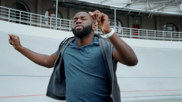 Afro Man Dancing at Sports Stadium. Sportsman Performing Hip Hop Dance ...