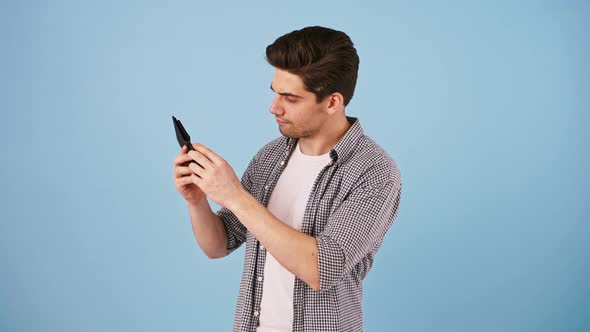 Young Guy is Opening Wallet Which is Empty Shaking It but There is No ...