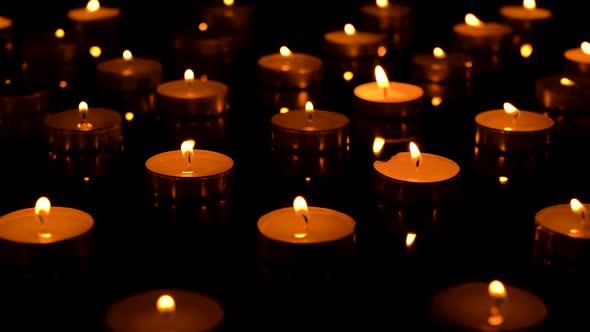 Mourning candles on a black surface, Stock Footage | VideoHive
