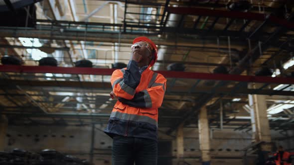 Industrial Supervisor Thinking Wearing Safety Uniform at Modern ...