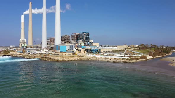 Hadera Park, Orot Rabin Power plant aerial pull out shot over ...