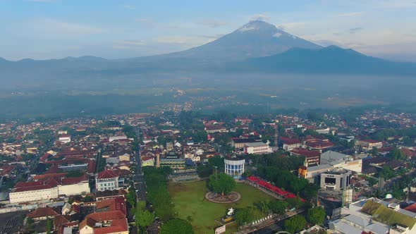 Aerial panorama of downtown Magelang Indonesia and Mount Sumbing and ...