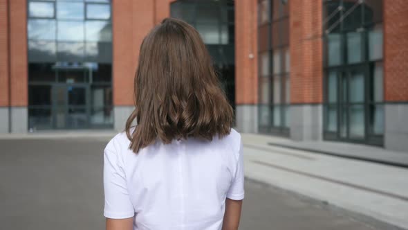 Walking Female Designer, Back View, Slow Motion, Stock Footage | VideoHive