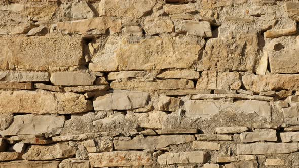 Close-up of ancient masonry construction 4K 2160p 30fps UltraHD tilting ...