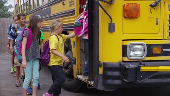 Students get onto school bus, Stock Footage | VideoHive