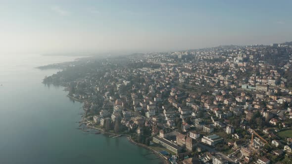 Stunning aerial of beautiful coastal city. Shot in Pully, Switzerland ...