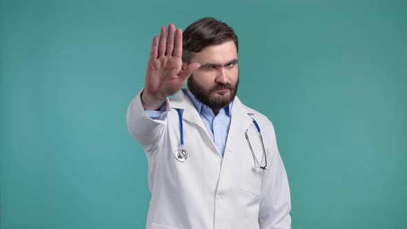 Portrait of Serious Doctor in Professional Medical White Coat Showing ...