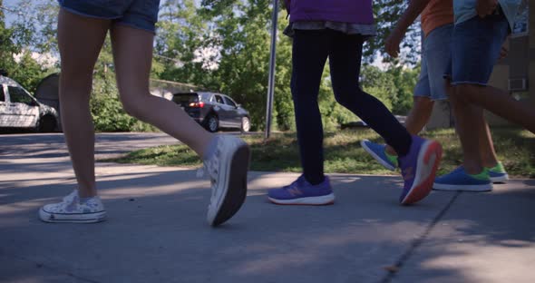 Kids walking on sidewalk close up feet, Stock Footage | VideoHive