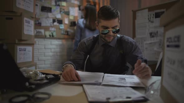 Private Detective Reading Case File Materials, Searching Criminal ...