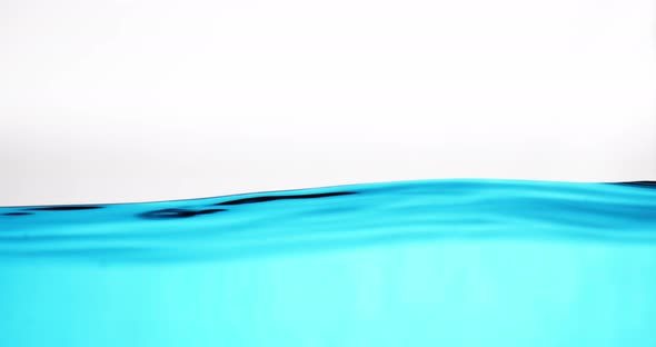 Blue Water Surface In Motion Against White Background, Stock Footage