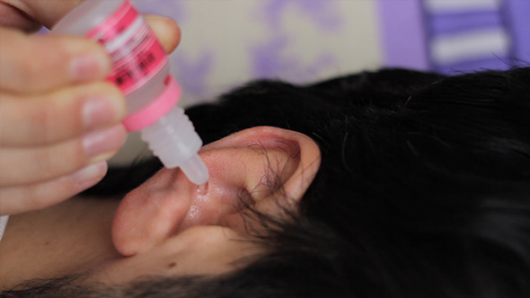 Pouring Medicine Drops in Ears, Stock Footage | VideoHive