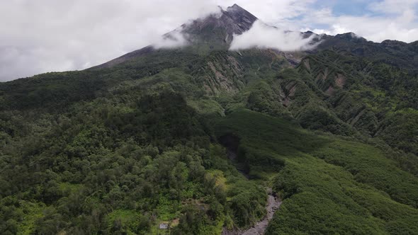 Aerial view of active Merapi mountain with clear sky in Indonesia ...