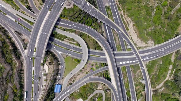 Massive multi level highway interchange with traffic on all routes ...