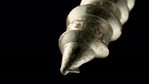 Sharper of a Steel Screw or Metal Bolt Rotating on Isolated Black ...