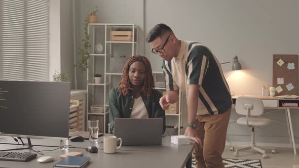 Diverse Couple of Programmers Coworking on Office, Stock Footage ...