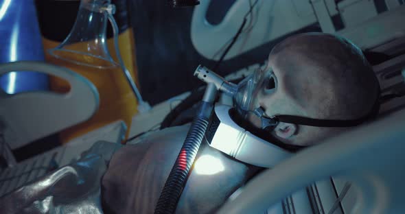 Alien Lies on an Operating Table Under an Artificial Respiration ...