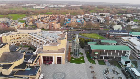 Flying over the Basildon Town Centre and St Martins Church towards ...