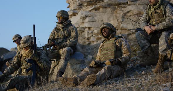 Soldiers Sitting During a Break in an Assault, Stock Footage | VideoHive