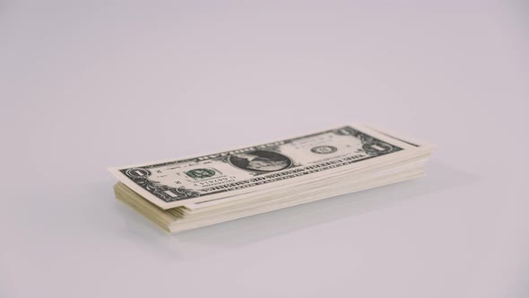 Stacks of Money Decreasing Time-lapse, Stock Footage | VideoHive