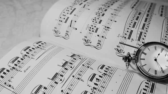 Pocket Watch on the Background of Musical Notes, Stock Footage | VideoHive