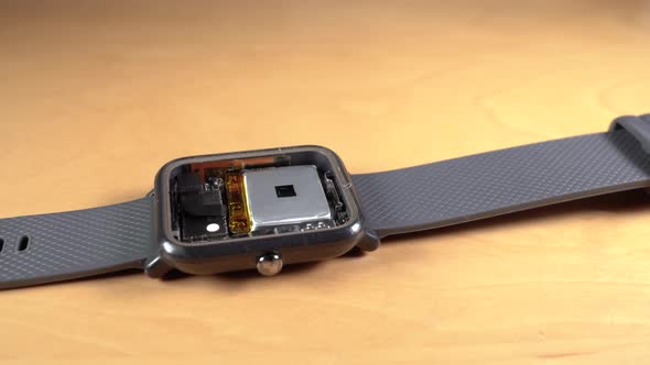 Disassembled Smartwatch Showing the Interior Battery Different Sensors ...