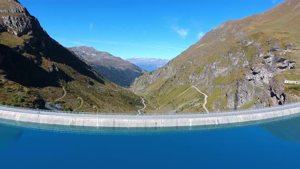 Moiry dam in the Swiss AlpsAerial shot, autumn colors, Stock Footage