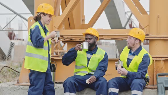 Cheerful Construction Workers Eating Lunch, Stock Footage | VideoHive