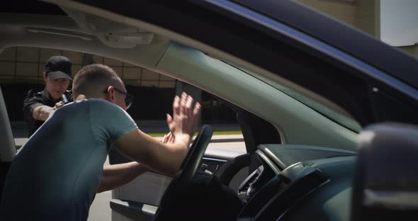 Female Police Officer Arresting Male Driver, Stock Footage | VideoHive