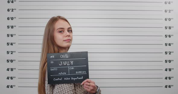 Mugshot of Criminal Young Woman with Long Blond Hair Turning Head and ...