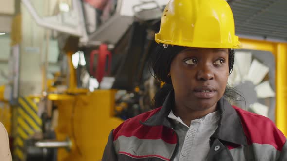 Female Engineer Speaking with Managers in Industrial Plant, Stock Footage