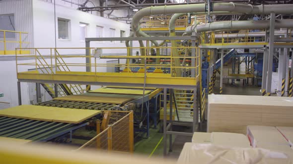 Cut-Up Slabs of Rockwool Moving along Automated Production Line, Stock ...