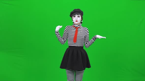 Mime Girl Is Eating Something, Showing Thumbs Up, Stock Footage | VideoHive