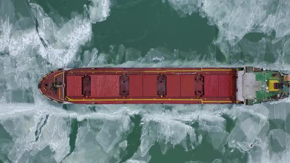 Aerial Above Epic Huge Steel Icebreaker Breaks Ice By Bow of Ship and ...
