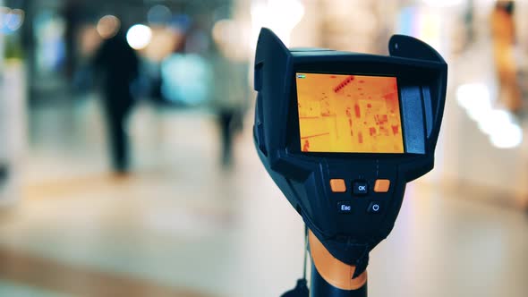 Thermovision Device Is Scanning Temperature in a Public Place, Stock ...