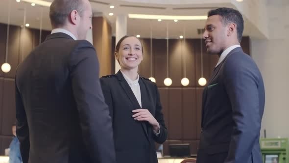 Meeting with Coworkers in Hotel Lobby, Stock Footage | VideoHive